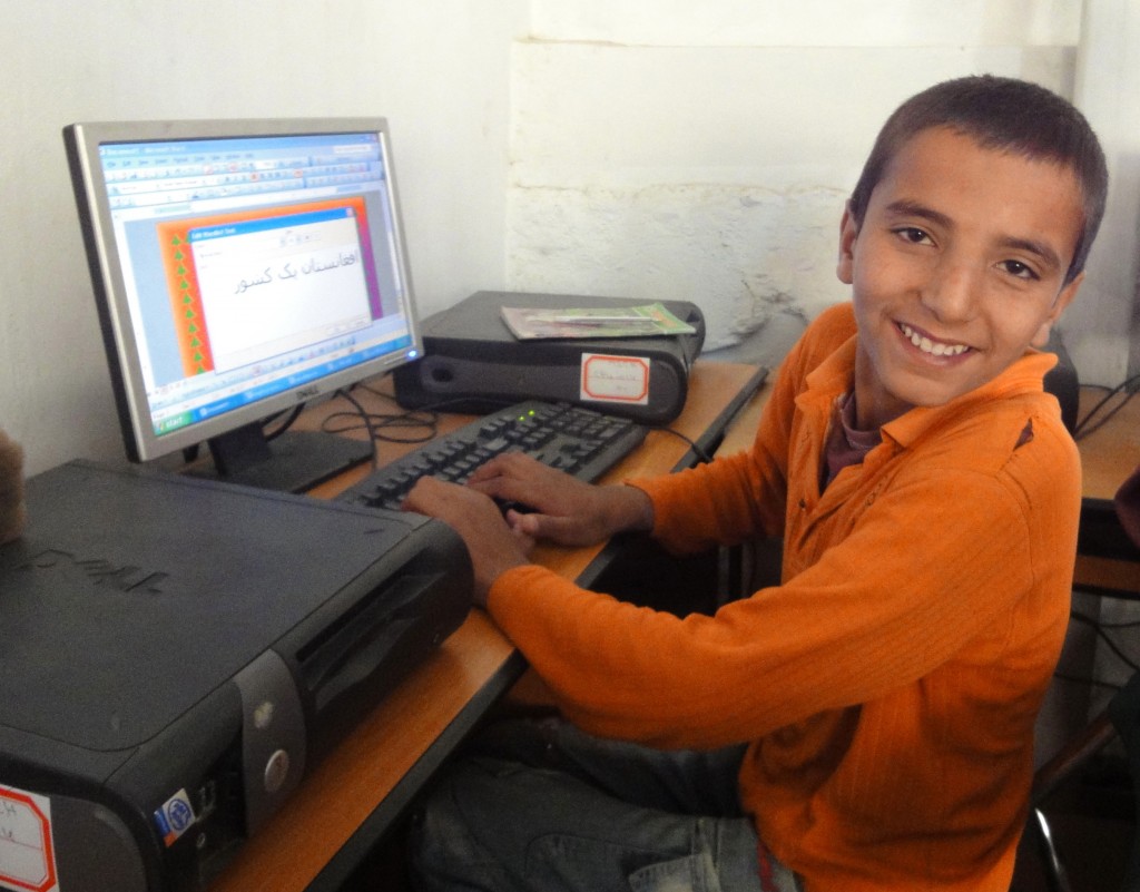 One boy computer class | Trust in Education
